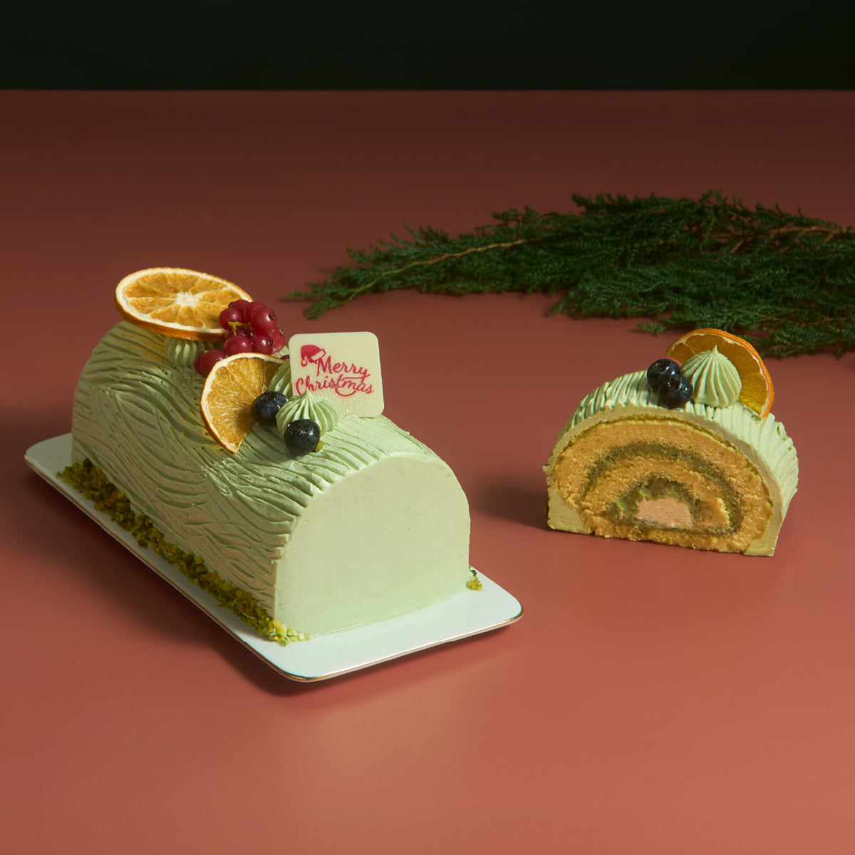 Xmas 2025 - Pistachio Orange Rhapsody Log Cake – Cedele